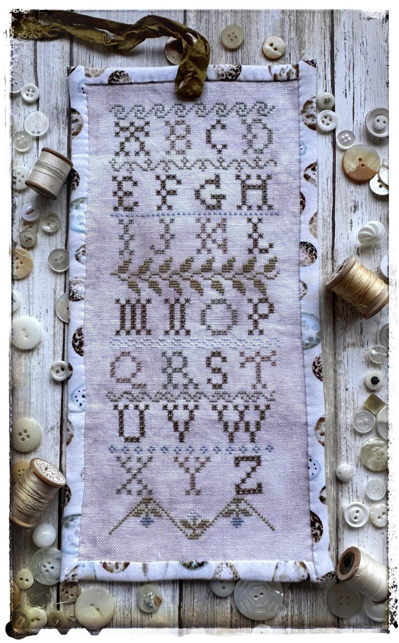 Eyelet Sampler Roll by Lucy Beam | Floss & Flame